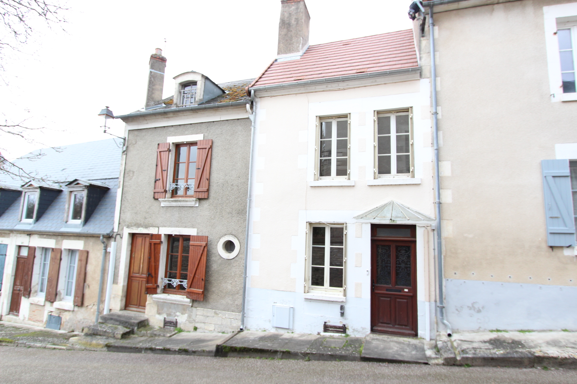 Vente Ensemble immobilier comprenant deux maisons de ville avec courettes.
